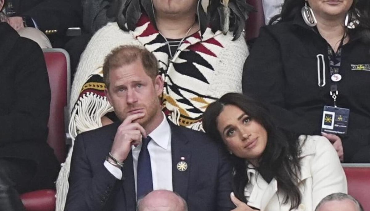 Why was Meghan Markle being 'clingy' with Prince Harry at Invictus ...