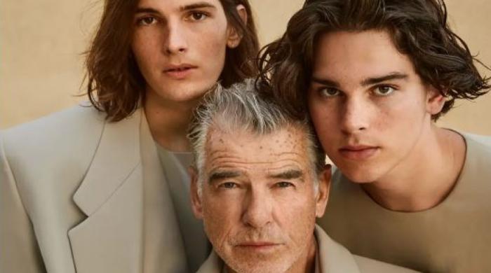 Pierce Brosnan stuns British GQ covers with sons Dylan and Paris
