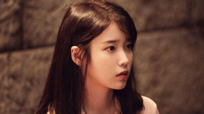 IU wins 'Rookie Actress Award' for 'Broker' at 'Chunsa International ...