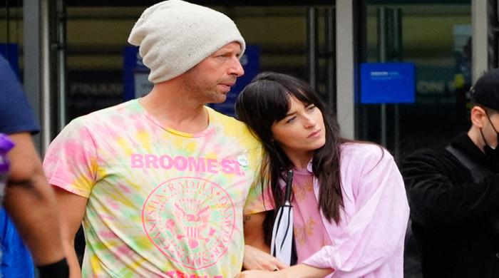 Coldplay's Chris Martin spotted with Dakota Johnson at the beach while ...
