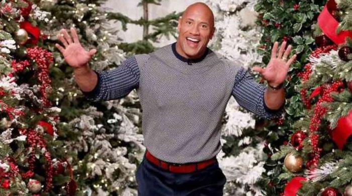 Dwayne Johnson enjoys festivity at its best, fully in holiday spirits