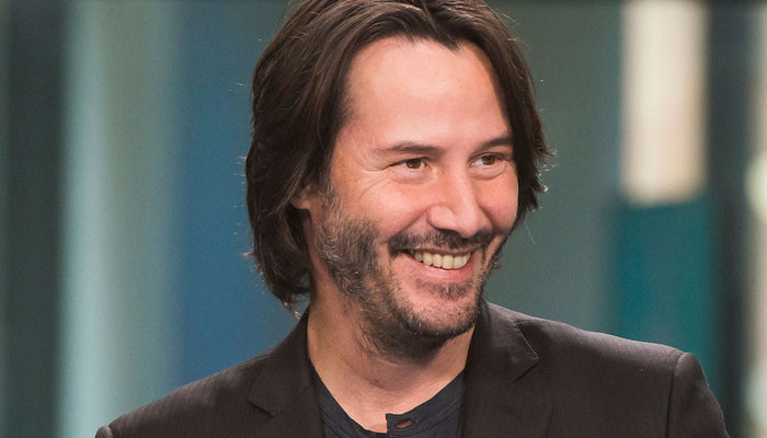 Keanu Reeves hangs out with the homeless