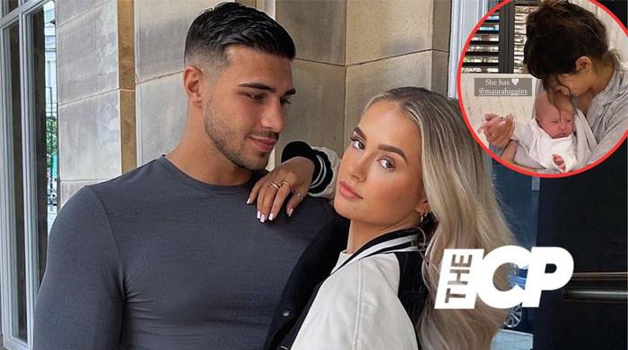 Maura Higgins plants a kiss on Molly-Mae Hague's baby daughter Bambi ...