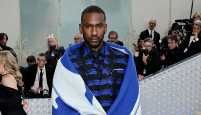 Skepta's Met Gala 2023 look: simple, Lagerfeld-inspired with ducks.