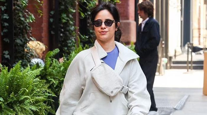 Camila Cabello DONS sweatshirt over ‘pale blue leotard’ heading to an ...