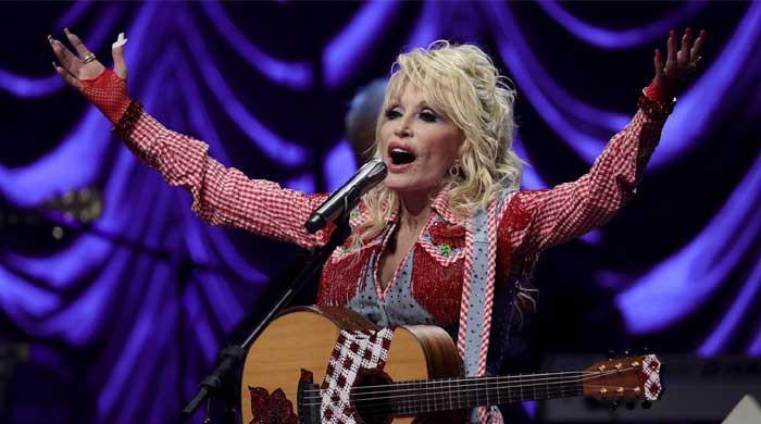 Dolly Parton will only ever retire if she drops 'dead on stage' while ...