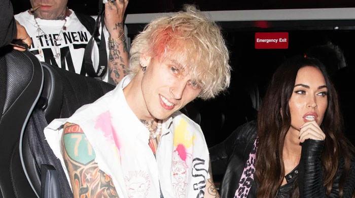 Machine Gun Kelly caught throwing first punch in fairground brawl - The ...