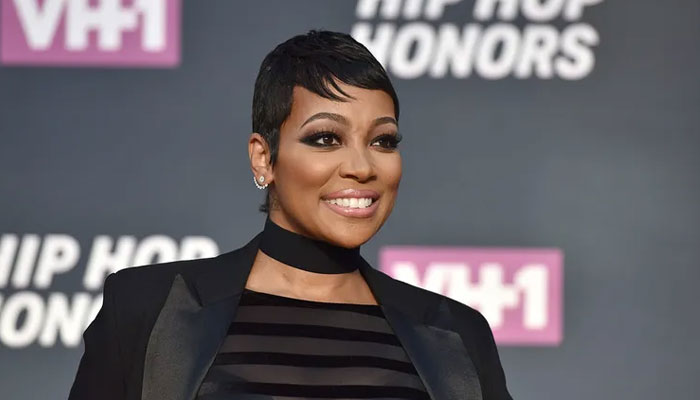 Singer Monica pauses concert to defend woman against assailant: Watch