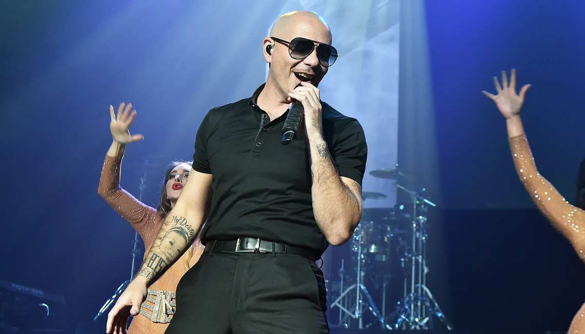 Pitbull reacts to fans hilariously dressing up as him for concerts